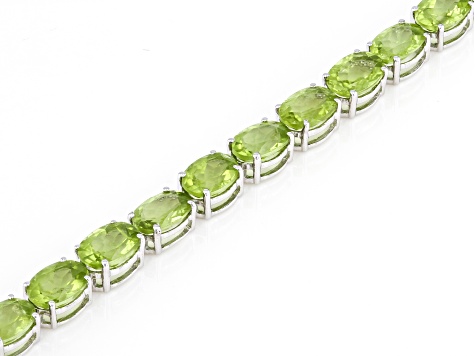 Green Peridot Rhodium Over Sterling Silver Tennis Bracelet 19.89ctw
